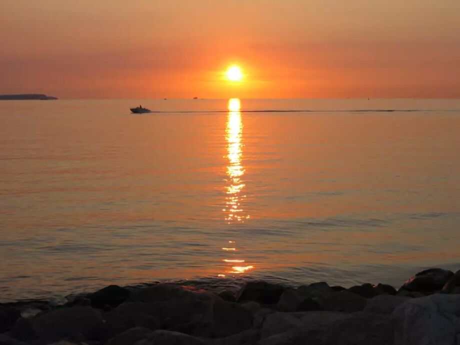 Solnedgång i sundet - Helsingborg, Skåne, Sverige - Akwi - Reseguiden